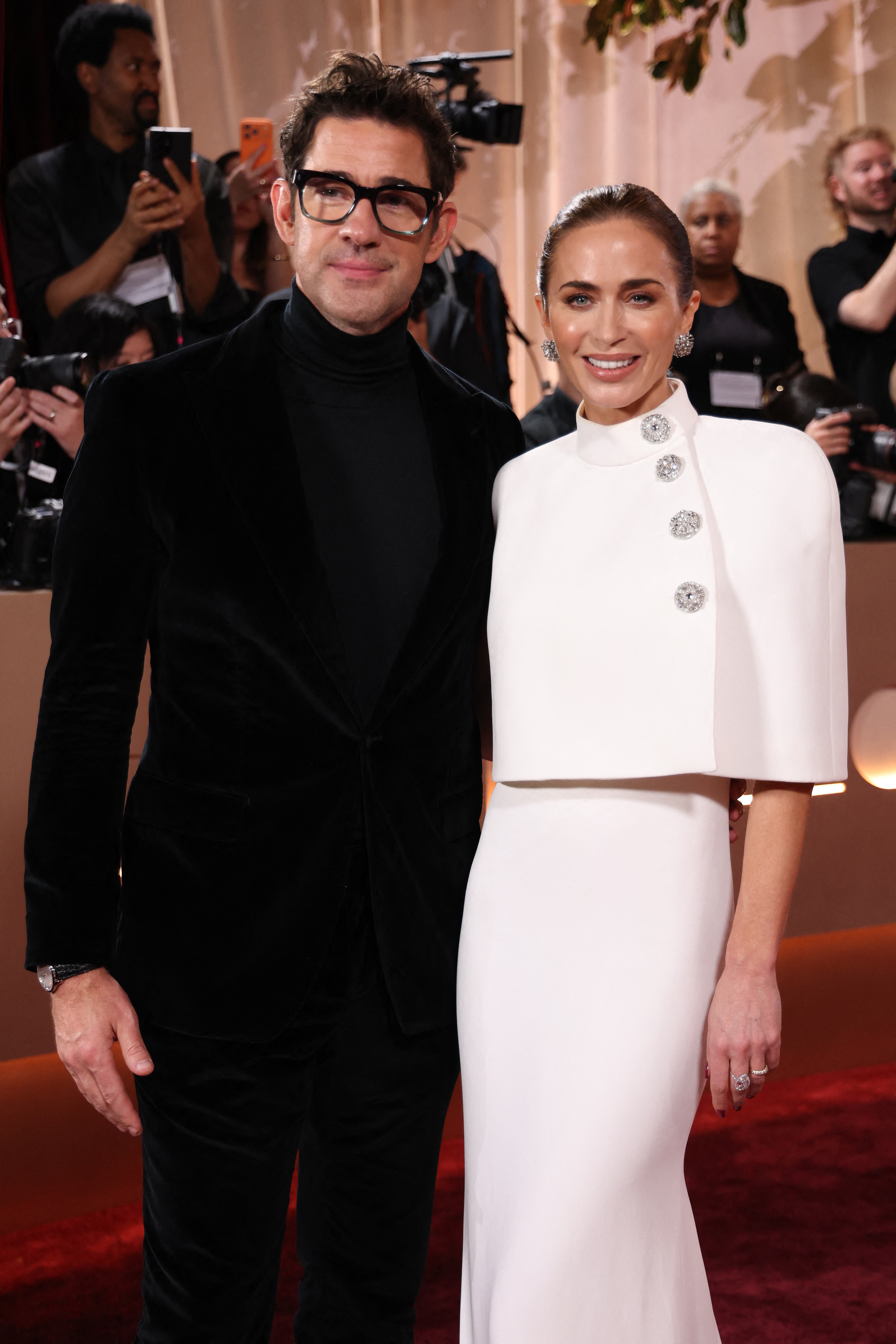 Emily Blunt Jokes About John Krasinski’s Risky Red Carpet Look