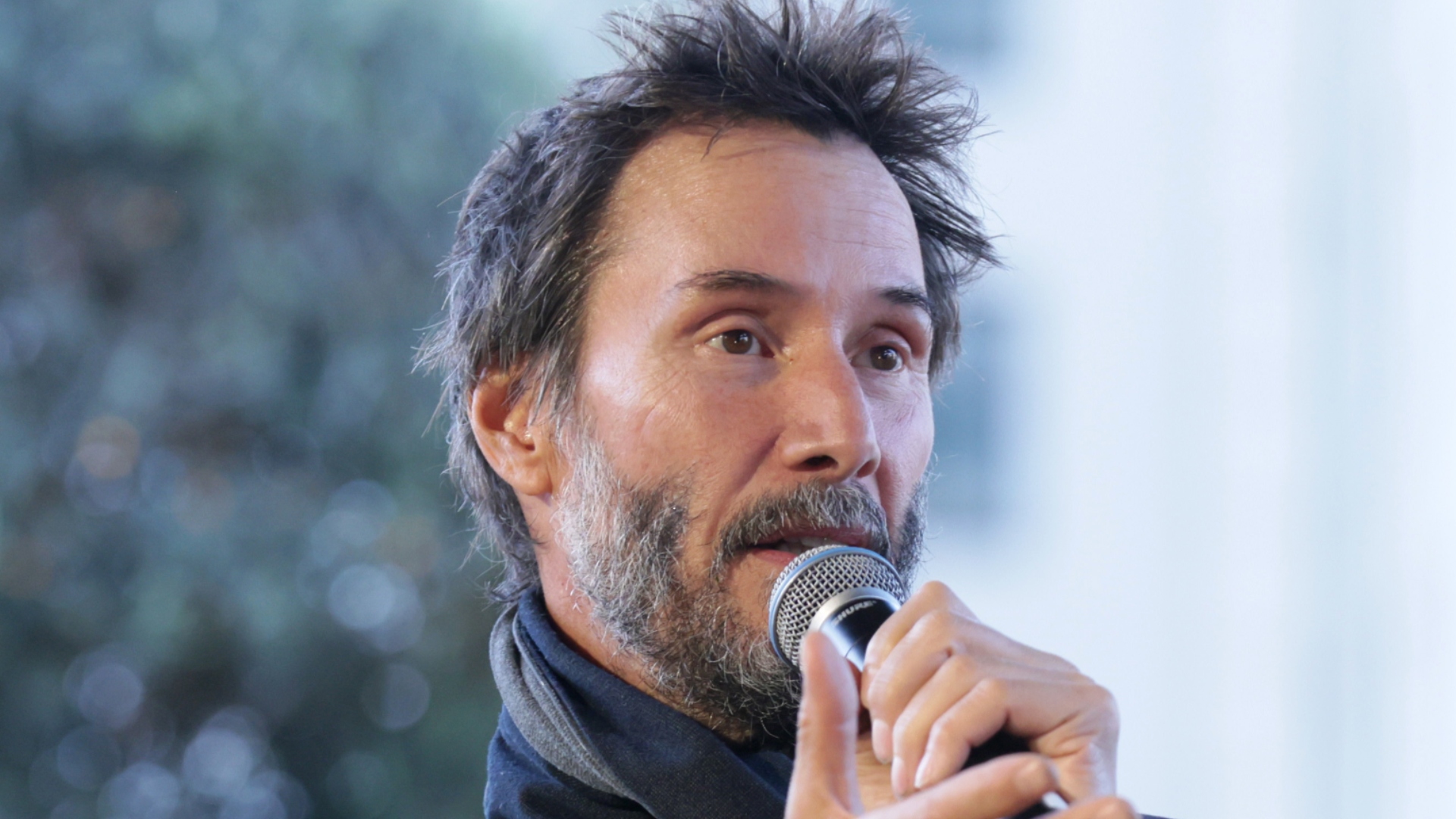 Keanu Reeves Lets His Hair Down as He Performs With His Band, Dogstar
